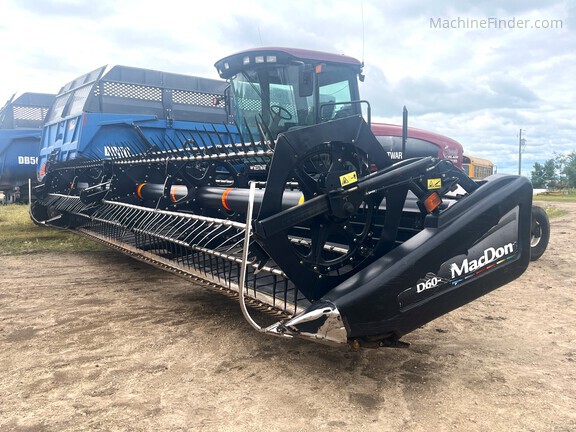 2009 MacDon M100 | Windrowers | MachineFinder